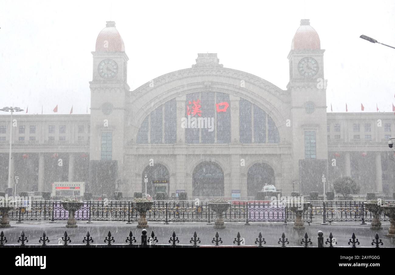 Wuhan. 15th Feb, 2020. Hankou Railway Station is seen in the snowfall ...