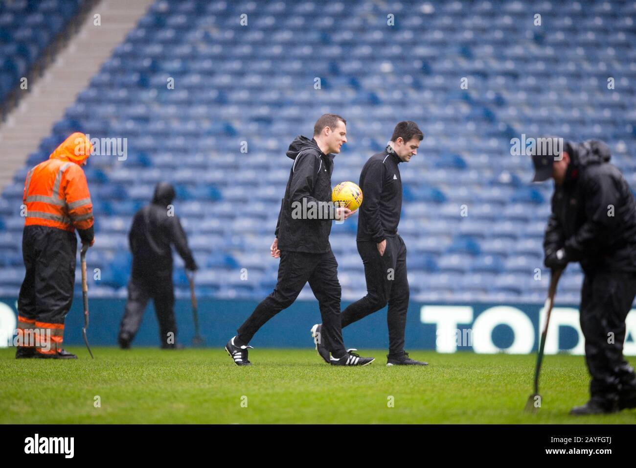 Referee Don Robertson inspects the pitch prior to the Ladbrokes ...