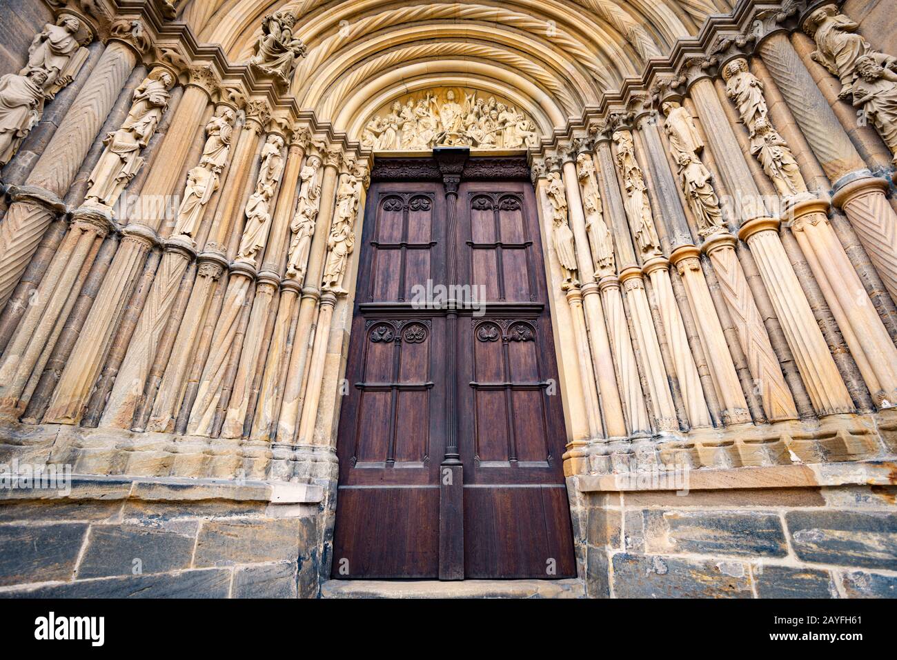 Grand doors of cathedral in Germany. Entrance in high arch with a lot ...