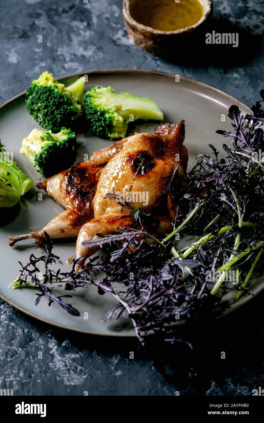 Roasted grilled quails Stock Photo - Alamy