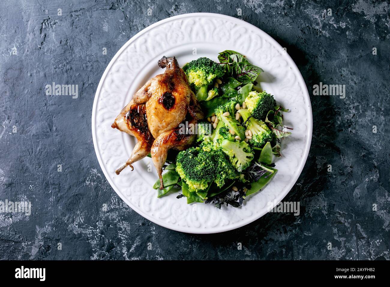 Roasted grilled quails Stock Photo - Alamy