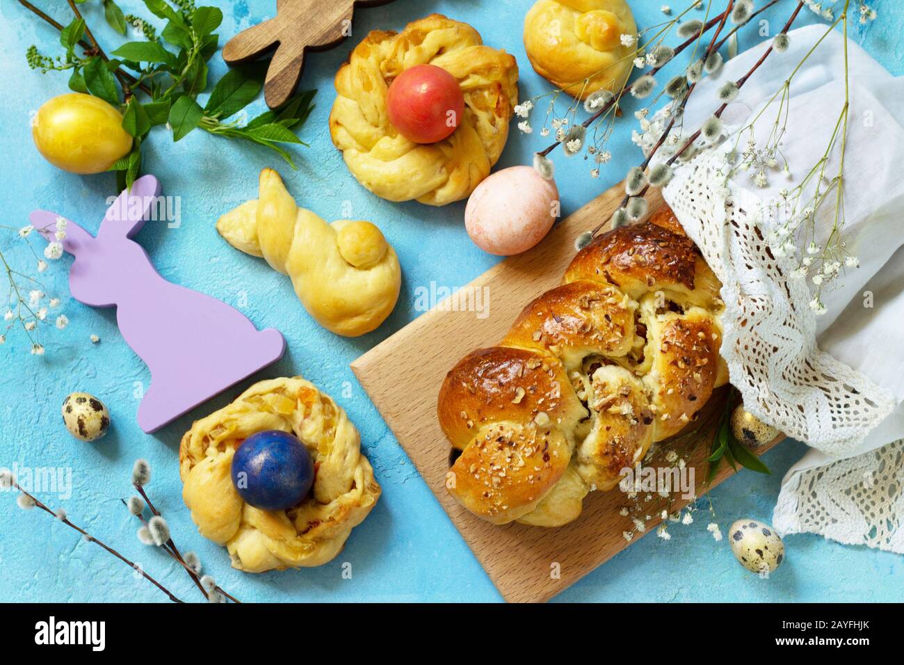 Easter sweet bread with colored eggs and traditional Italian Easter ...