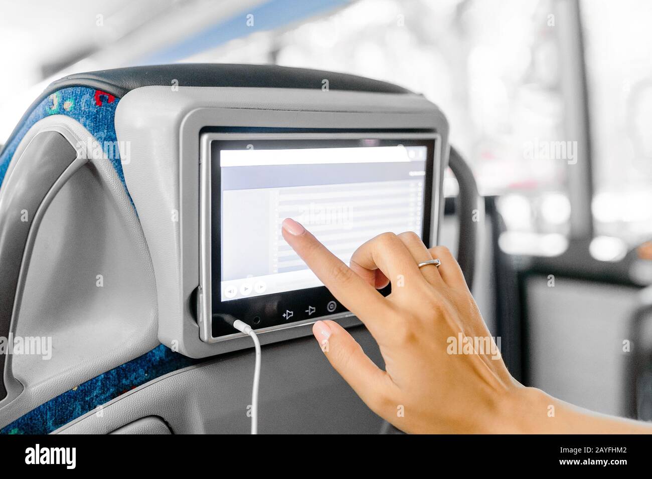 Interior of the bus with interactive touch screen, that is used to ...
