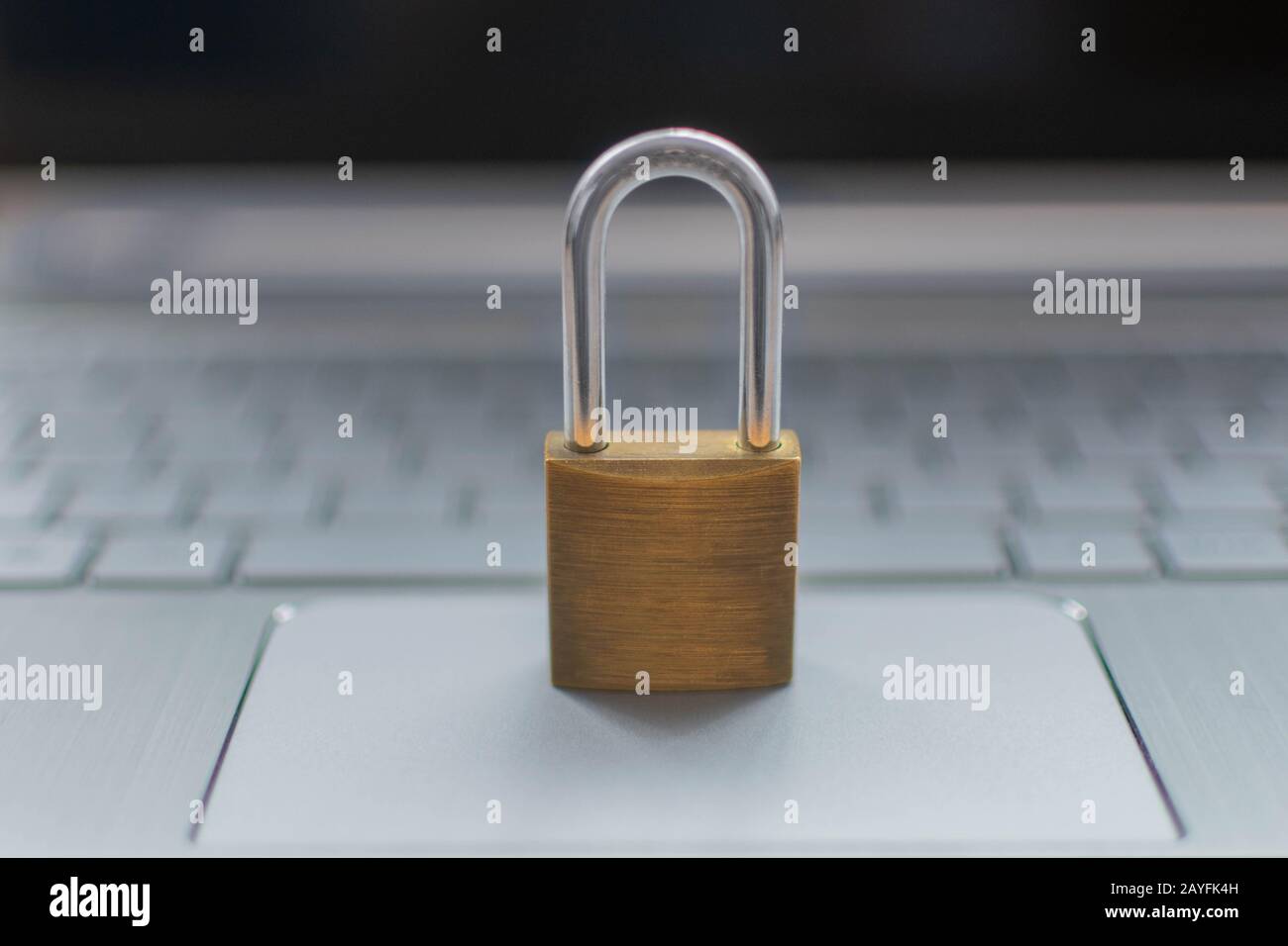 security lock on top of a laptop Stock Photo - Alamy