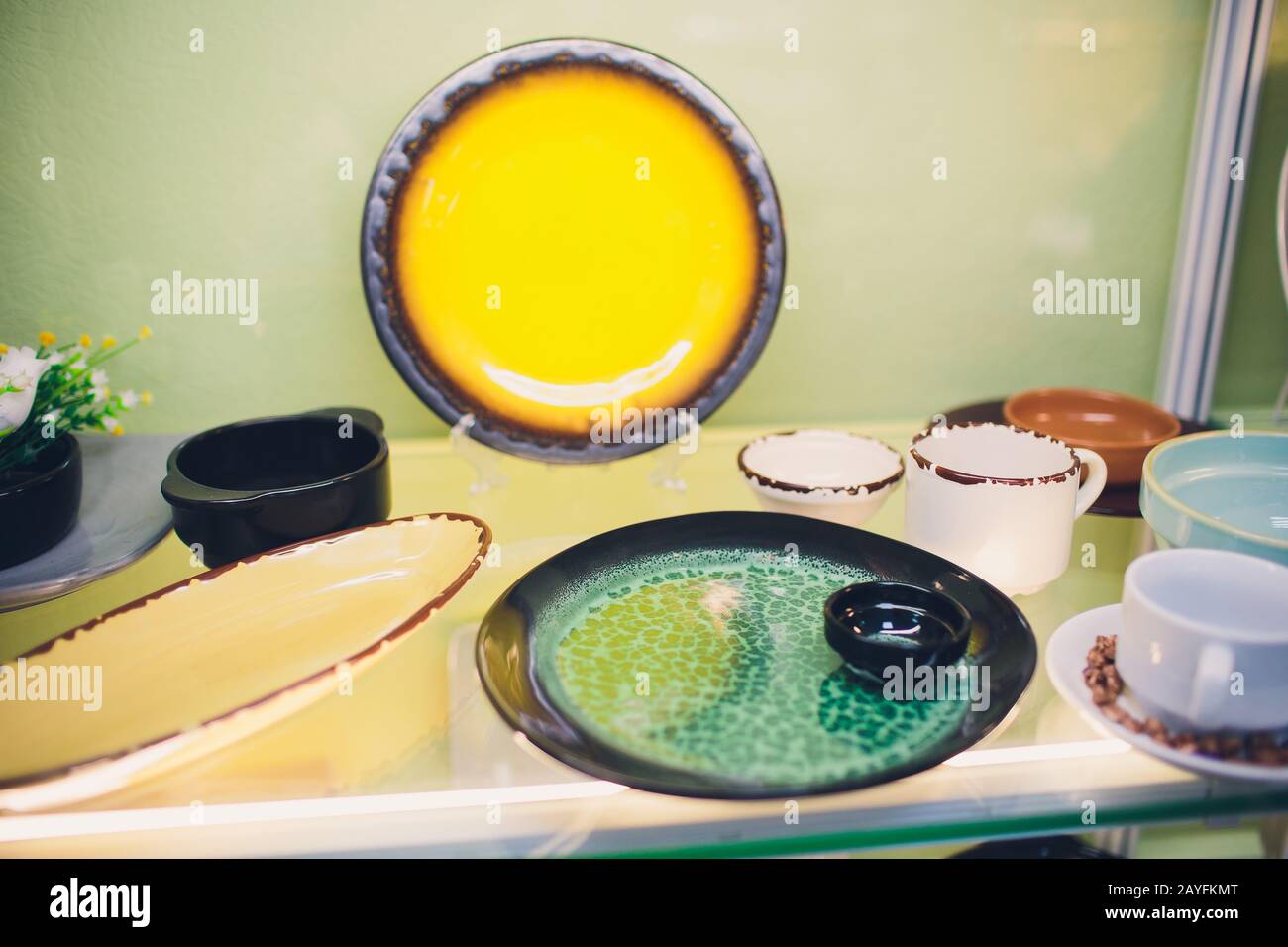 Stack of bowls in various shapes. Many colorful Sell at the market ...