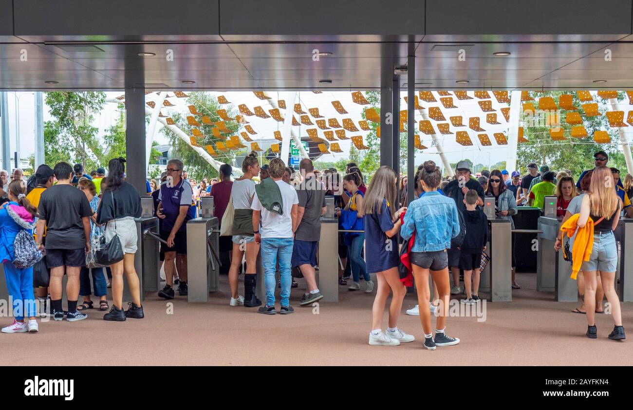 Fans entering through turnstiles at 2020 AFLW West Coast Eagles and ...
