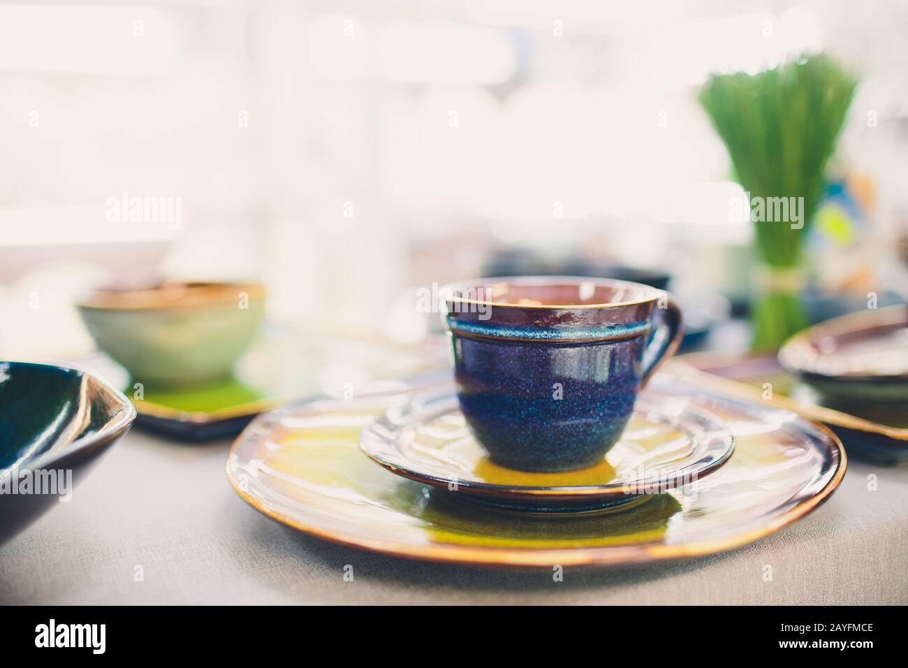 Designer handmade dishes, plates and cups in a stylish boutique Stock ...