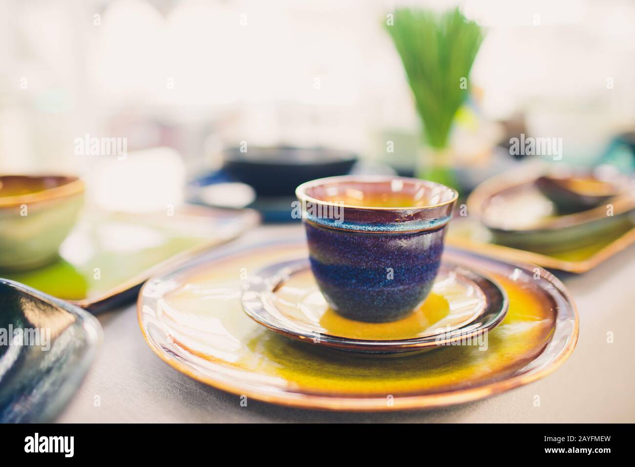 Designer handmade dishes, plates and cups in a stylish boutique Stock ...