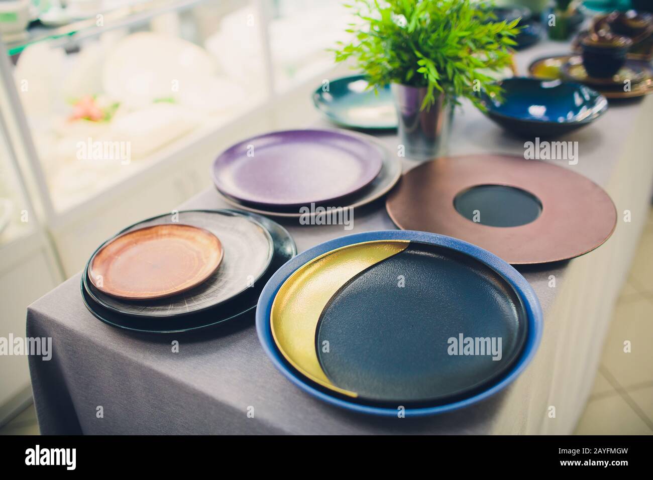 Stack of bowls in various shapes. Many colorful Sell at the market ...