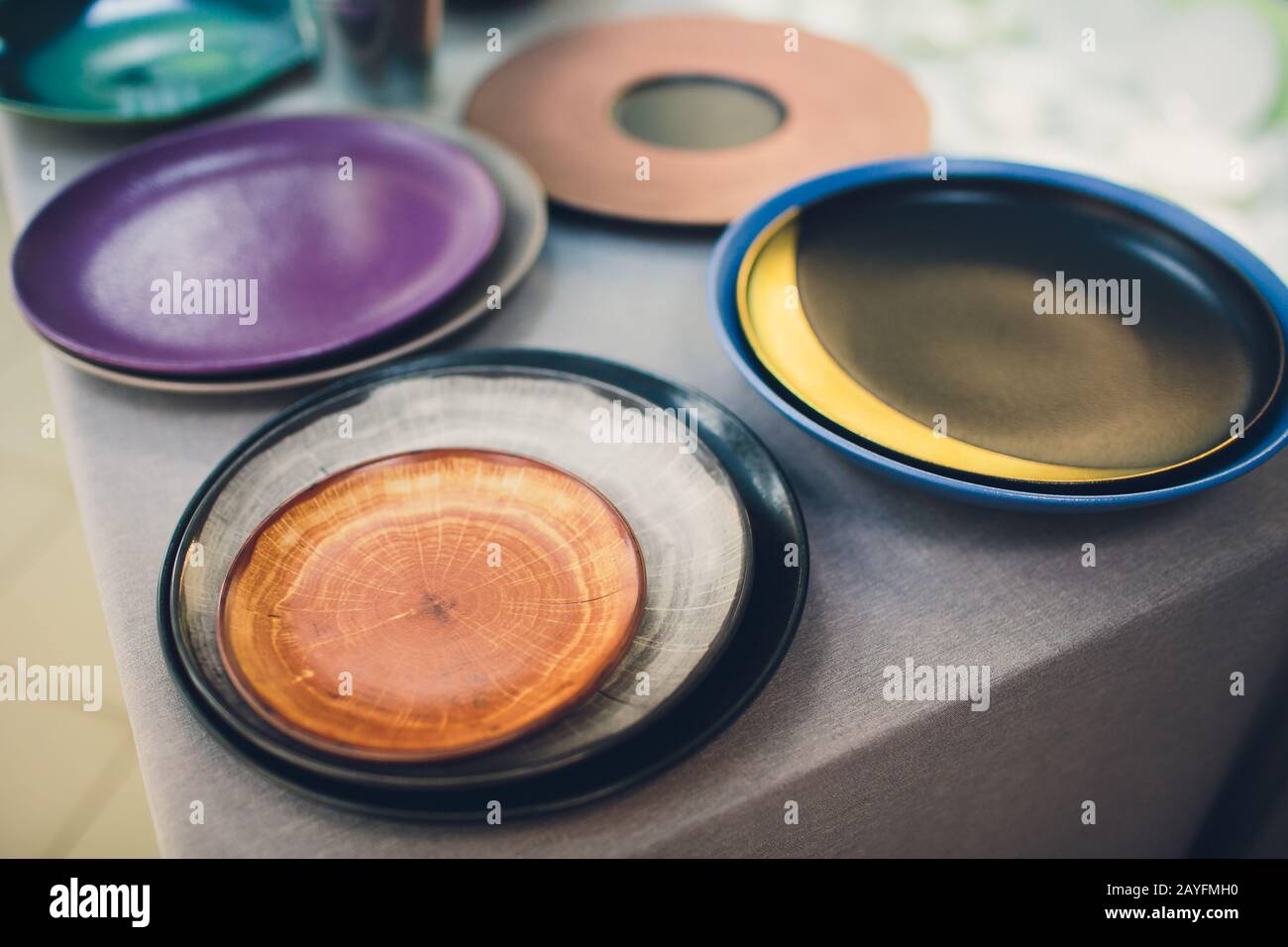 Stack of bowls in various shapes. Many colorful Sell at the market ...
