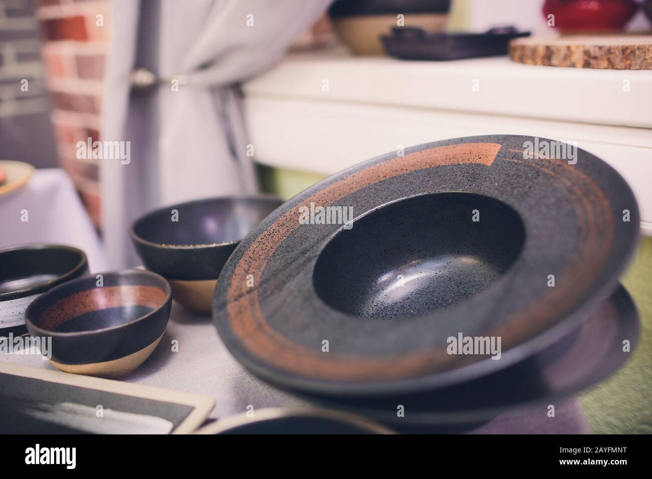 Stack of bowls in various shapes. Many colorful Sell at the market ...