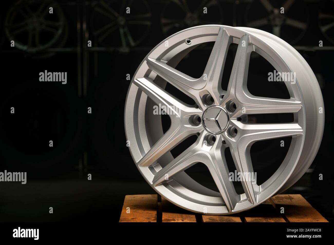 Mercedes Benz logo aluminum cast wheel, close-up, original silver wheel ...