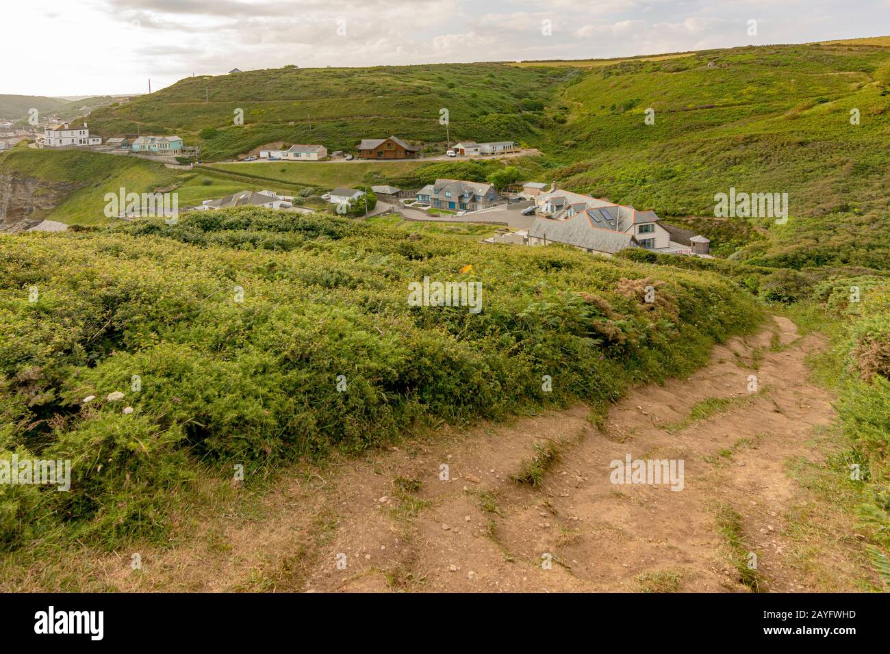 The South West Coast Path leading down a steep incline on Western Hill ...