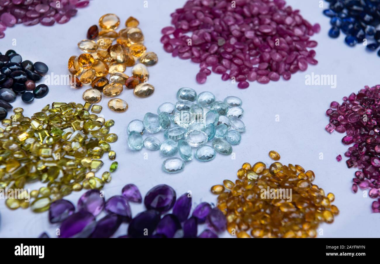 Mix shape and colorful cut mineral gemstones in jewelry market with ...