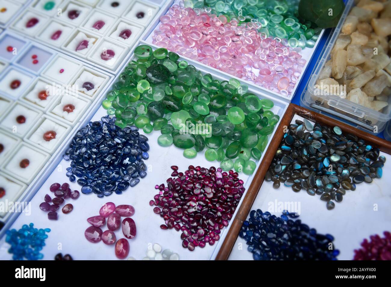 Mix shape and colorful cut mineral gemstones in jewelry market with ...