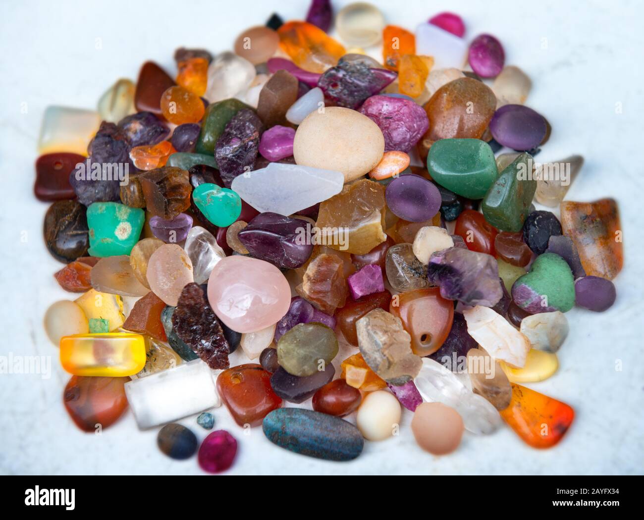 Mix shape and colorful mineral gemstones in jewelry market with outdoor ...