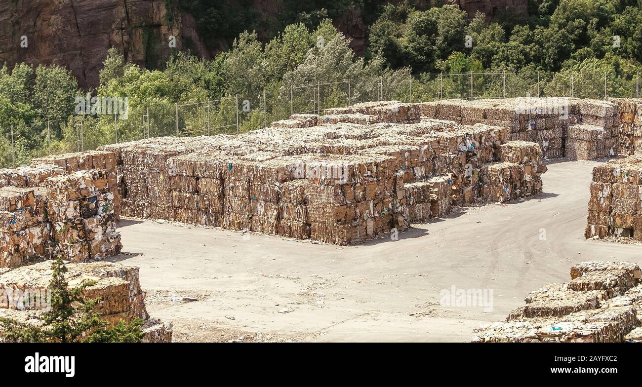Stack of pressed garbage and trash at recycle plant Stock Photo - Alamy