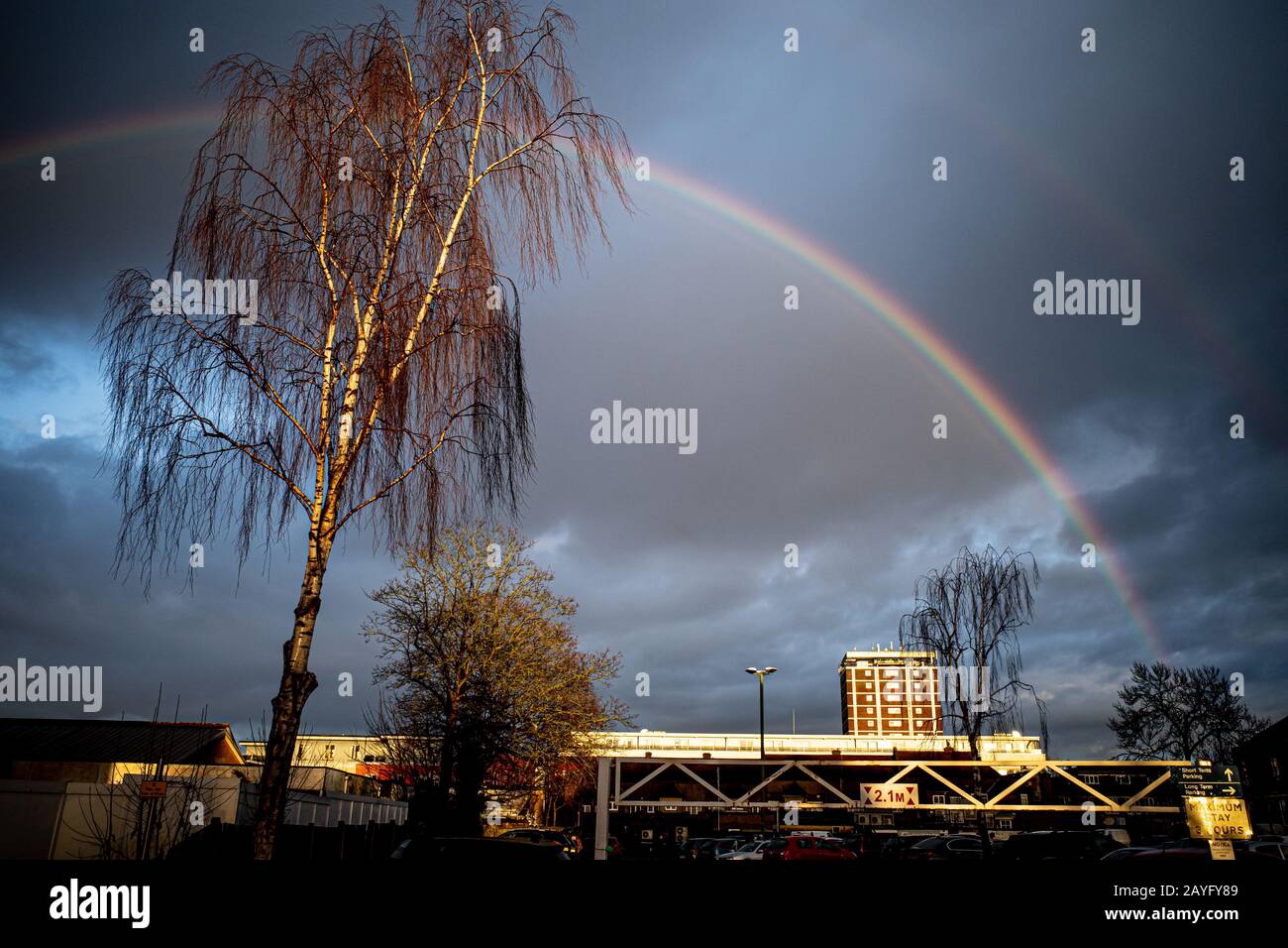 A rainbow above Wallington Library car park in Surrey Stock Photo - Alamy