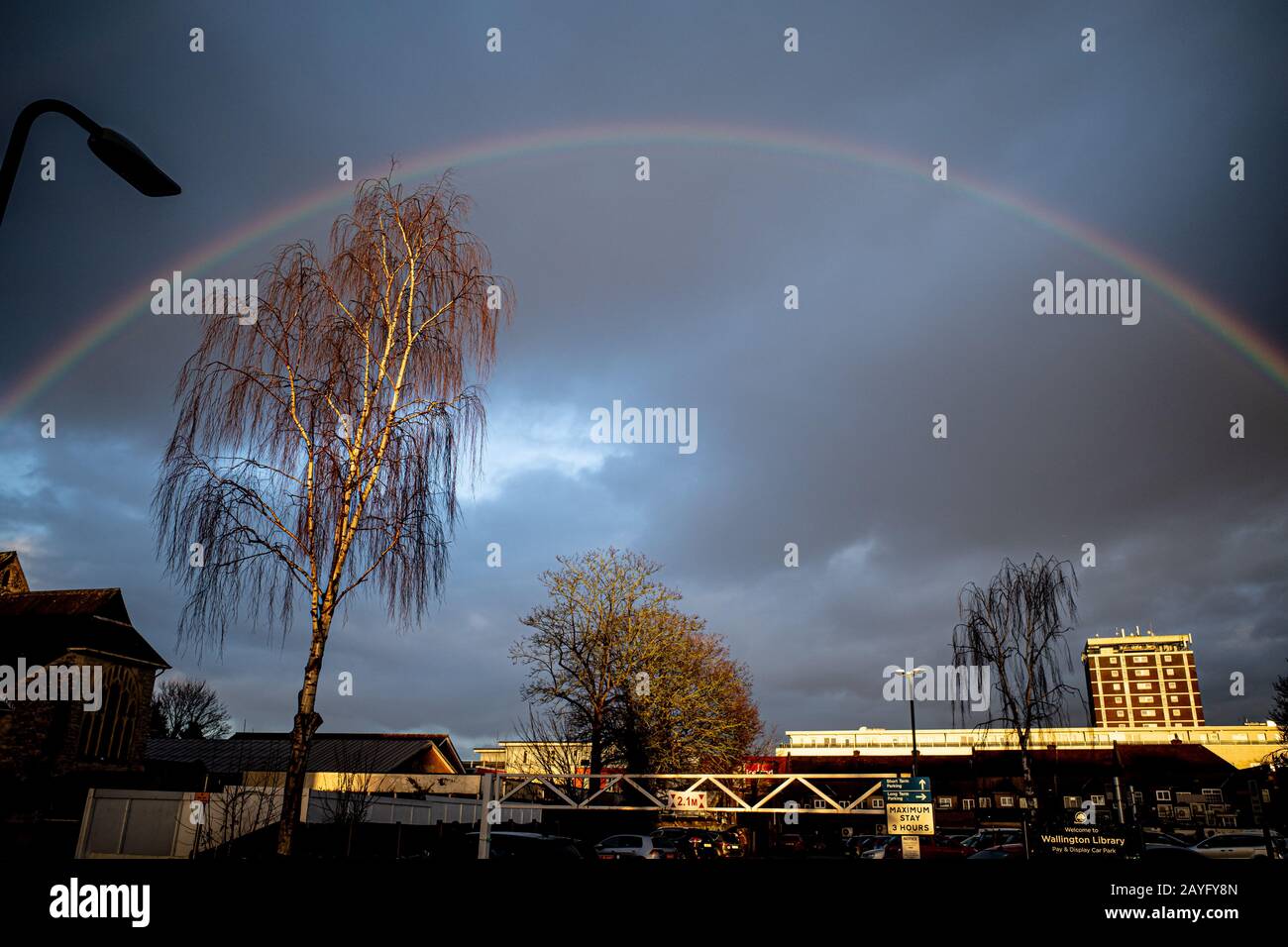 A rainbow above Wallington Library car park in Surrey Stock Photo - Alamy