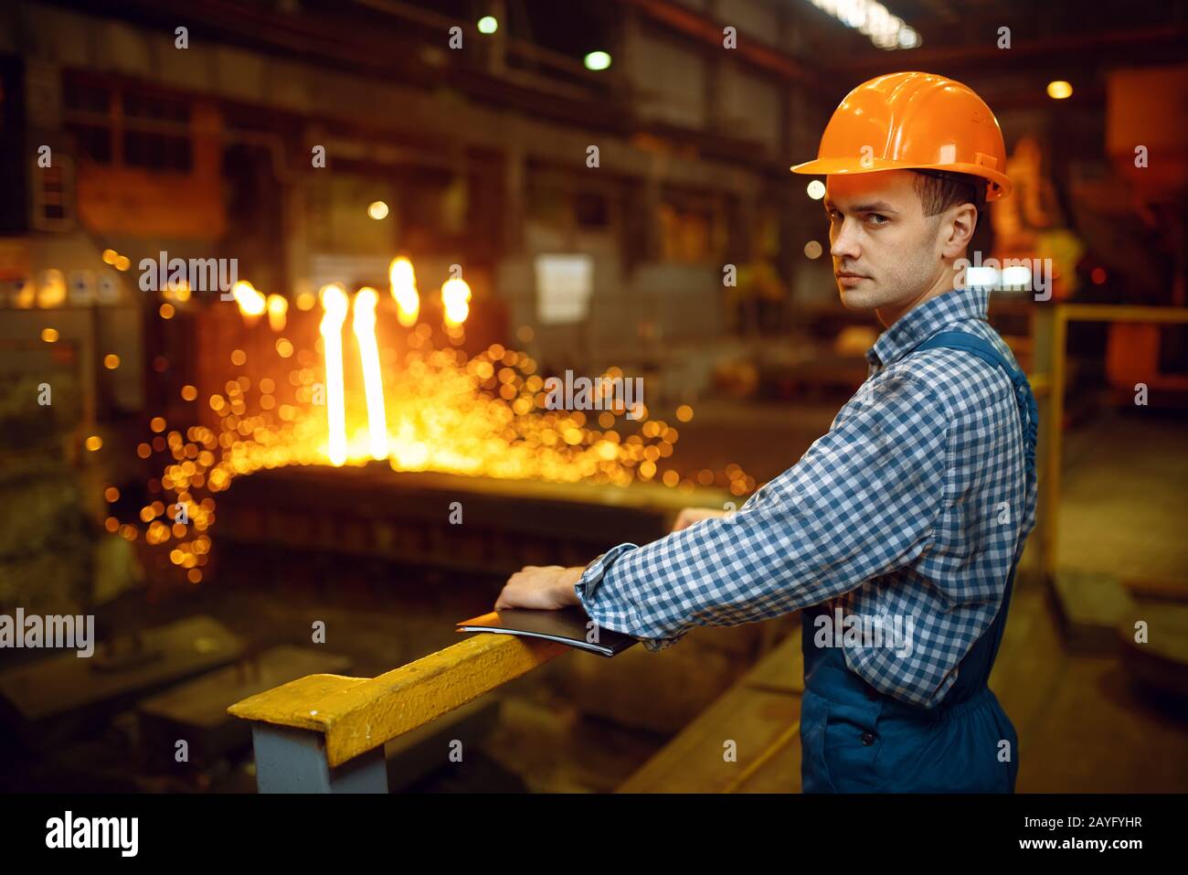 Master steelmaker at furnace, steel factory Stock Photo - Alamy