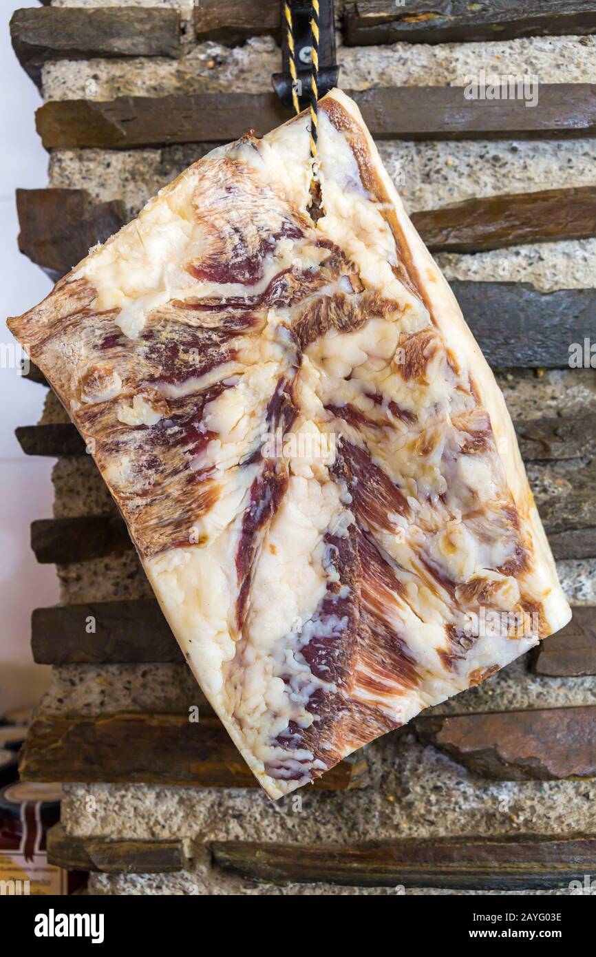 Slab of ham meat hanging at La Solera de la Alpujarra, Trevelez (one of ...