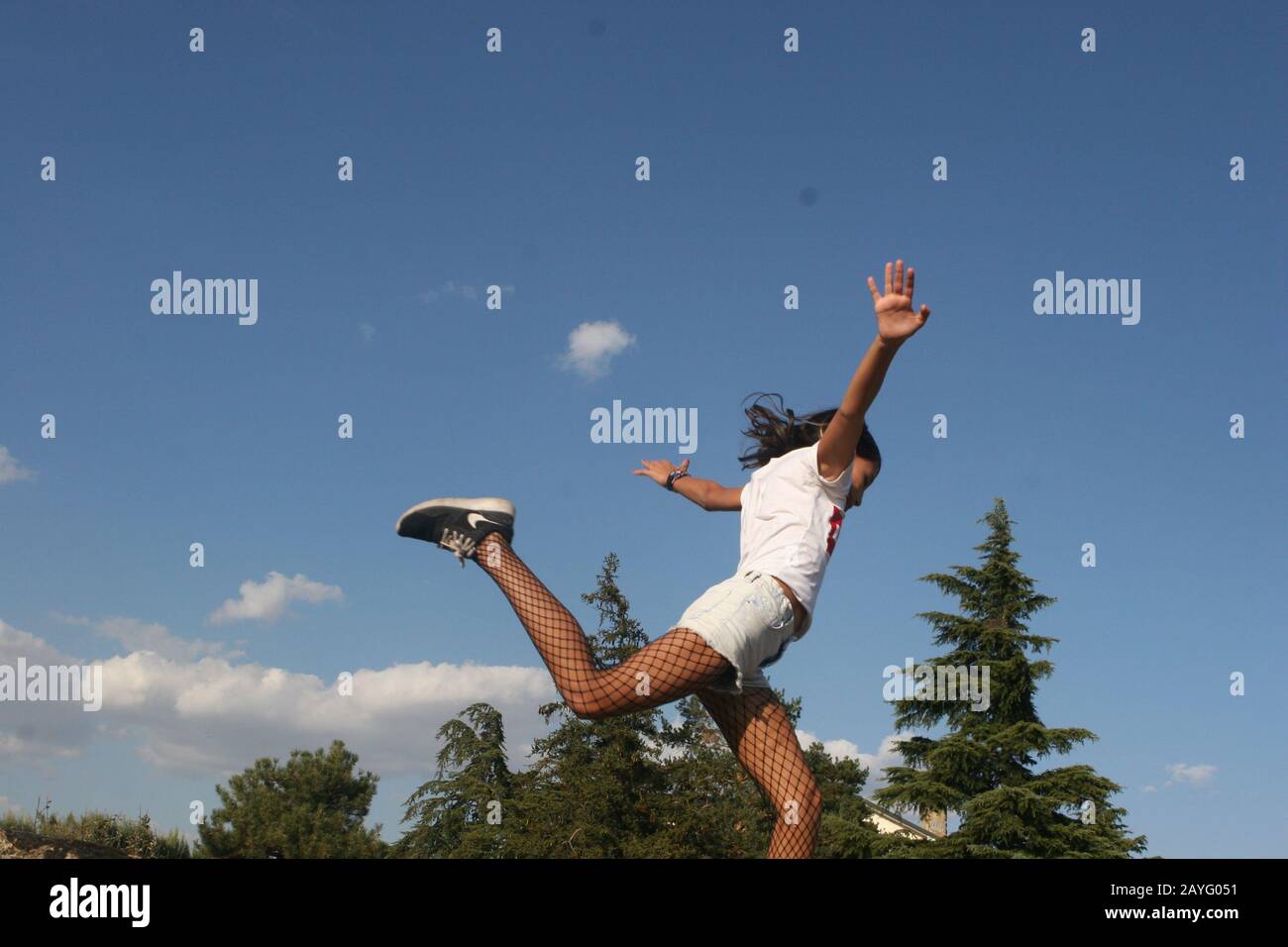 Black kid jumping hi-res stock photography and images - Alamy
