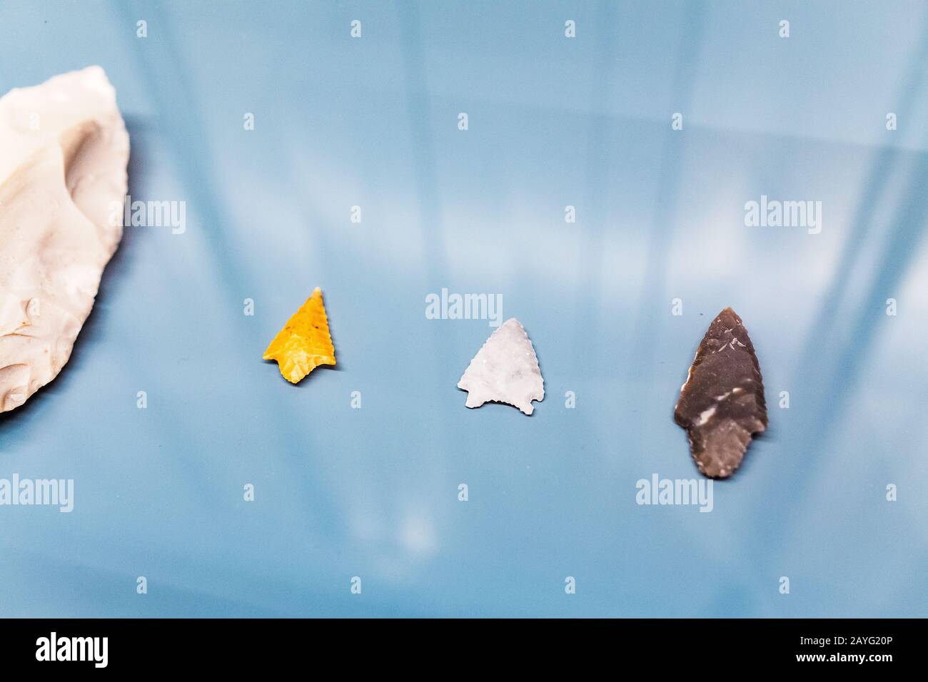 Stone arrowheads as primitive weapon and tools, archeology concept ...
