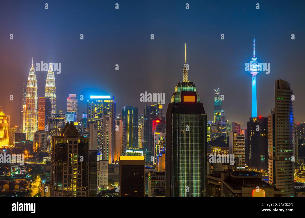 Kuala Lumpur city skyline, with the famous Petronas twin towers and the ...