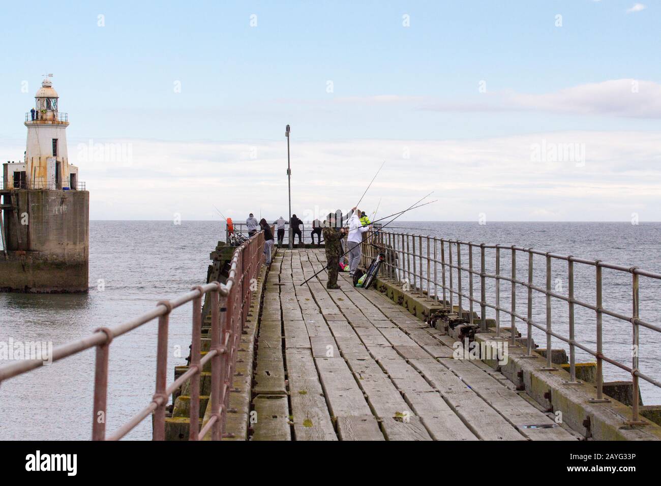 Fishing off Blyth pier, Northumberland Stock Photo - Alamy