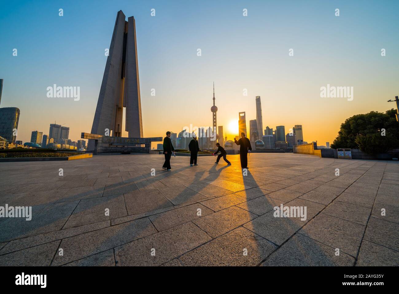 Shanghai, China - February 6, 2018: People playing Tai Chi on the Bund ...