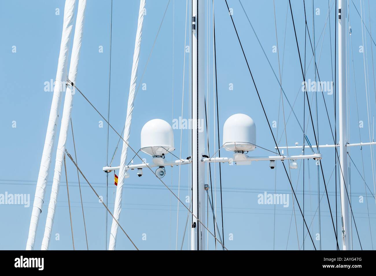 Closeup view of White Navigation radar system antennas of big white ...