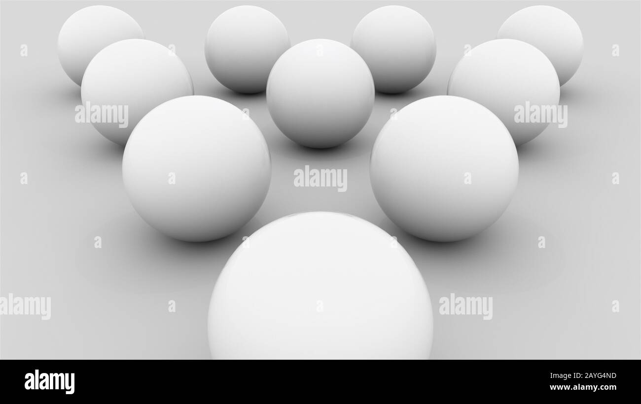 Computer generated composition of ten white balls lined with a triangle ...