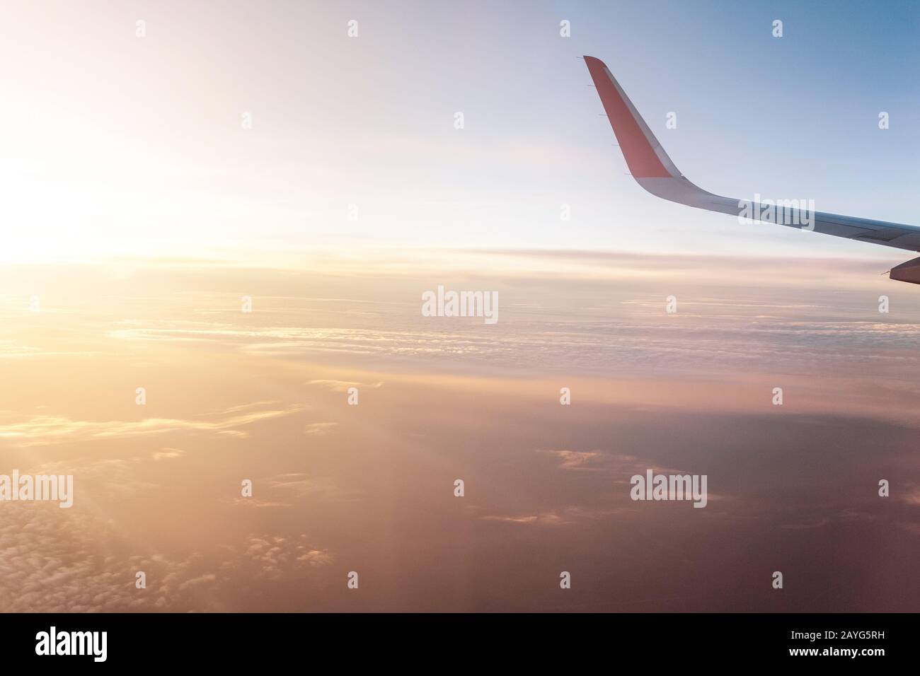 sunset through the window of an airplane Stock Photo - Alamy