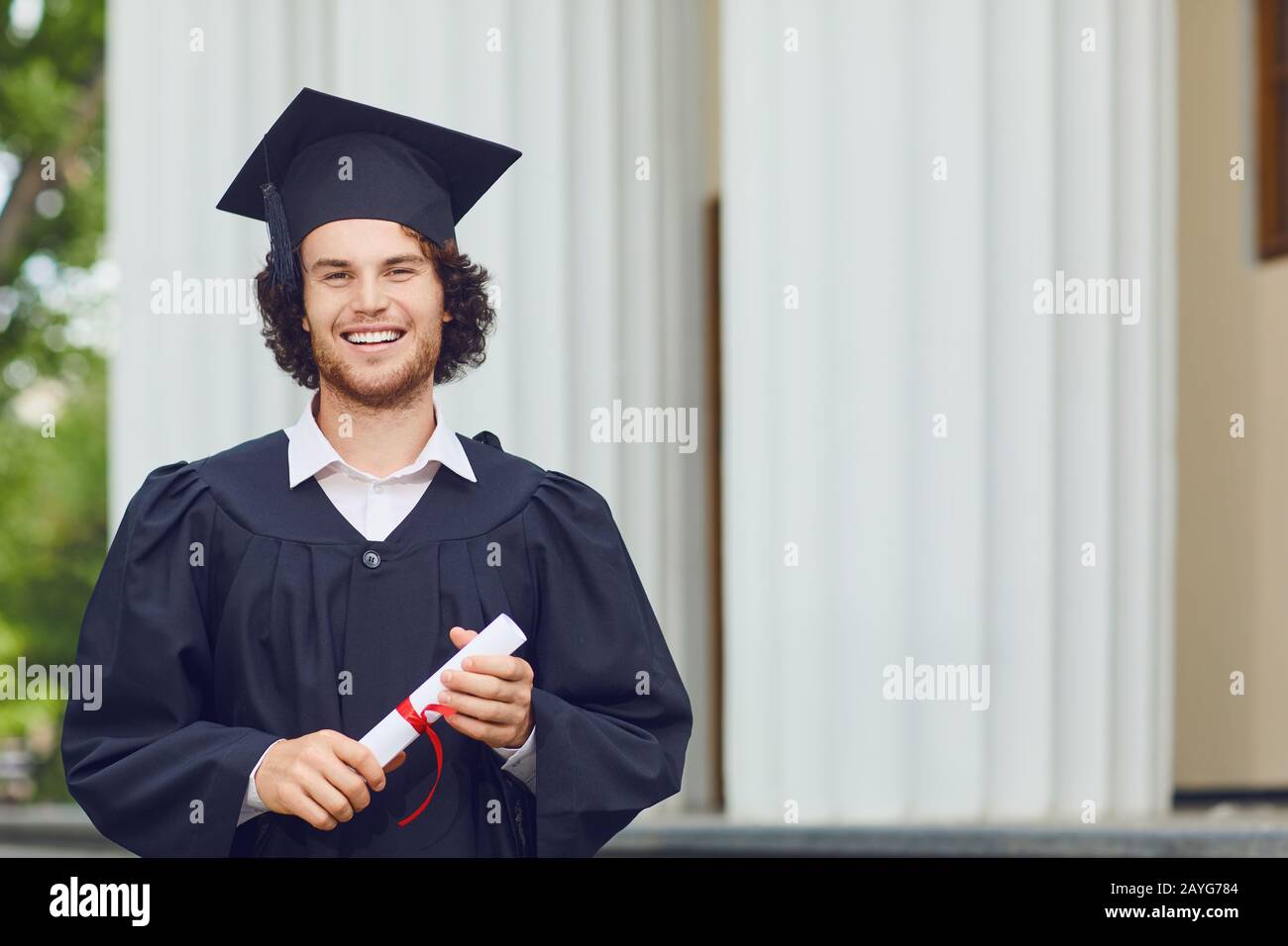 Male university graduate hi-res stock photography and images - Alamy