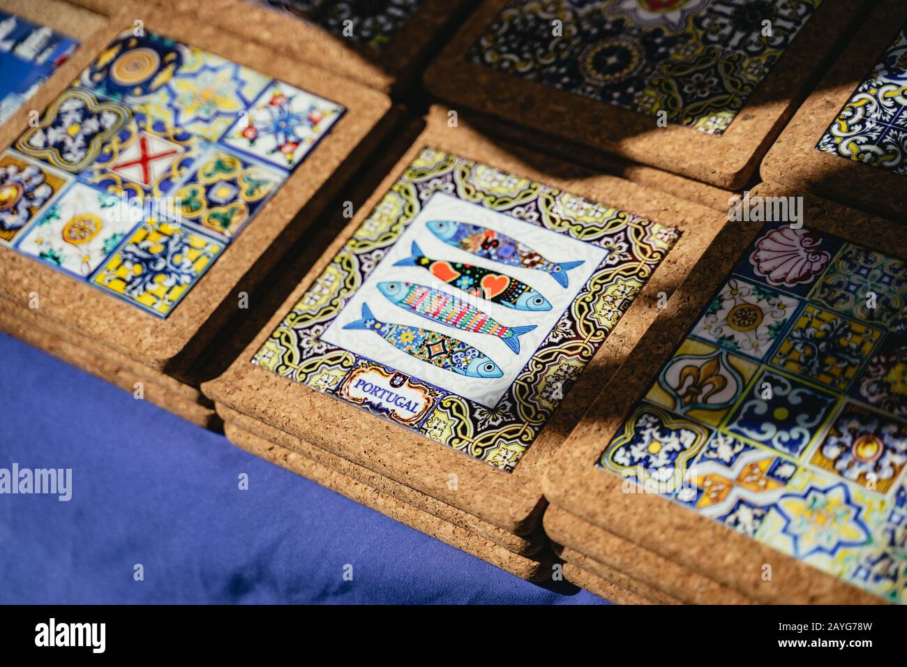 Selection of colorful ceramic tiles as souvenirs Stock Photo - Alamy