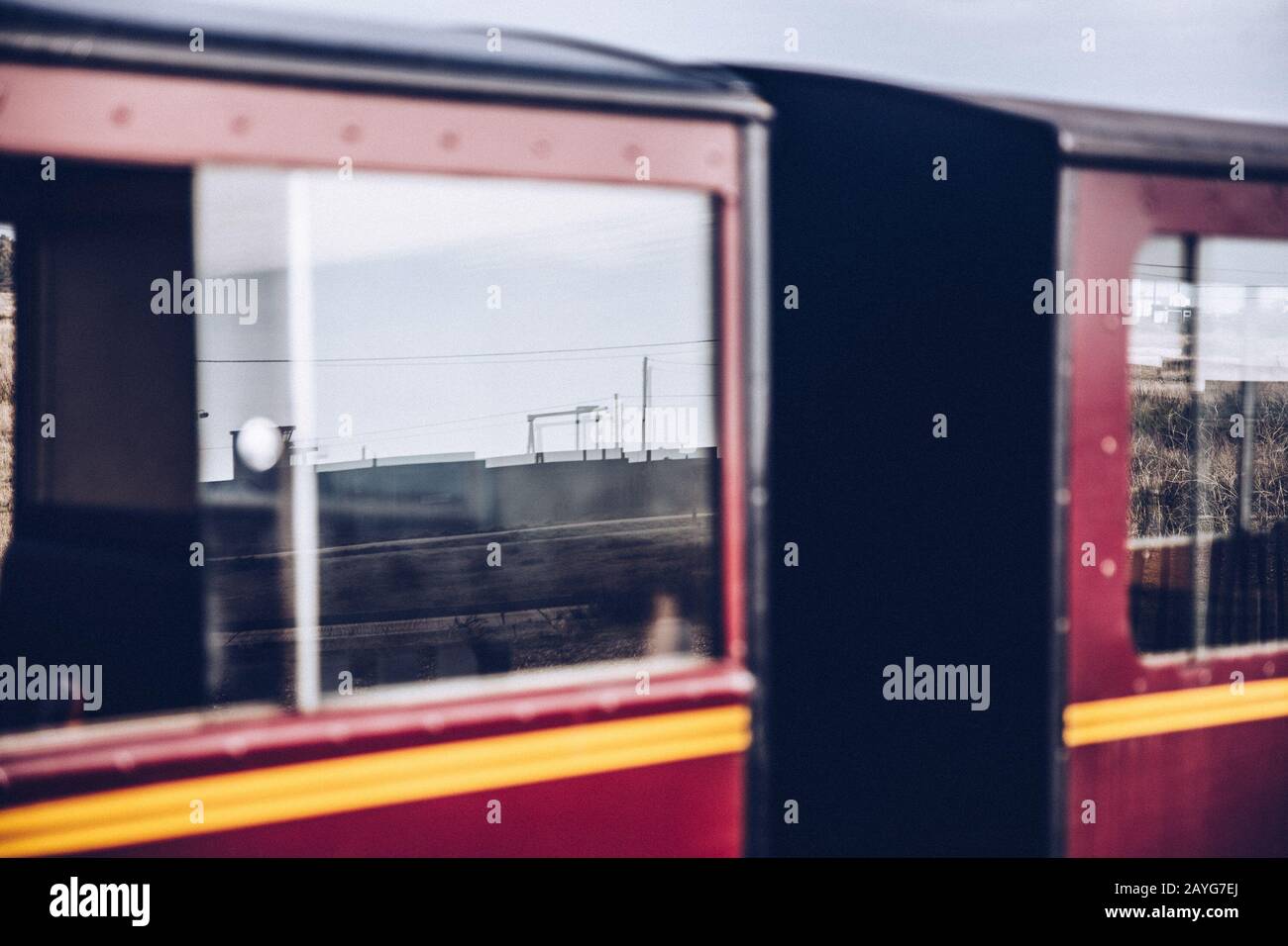 Reflection in train window of Dungeness Stock Photo - Alamy