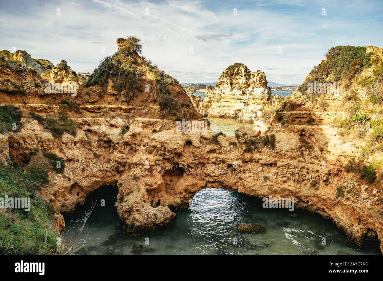 View of eroded sea caves and limestone cliffs Stock Photo - Alamy