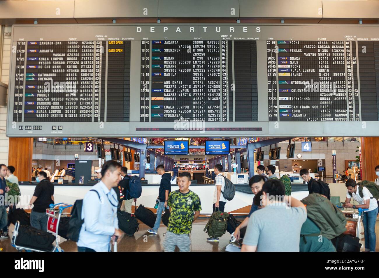 Changi airport flight information board hi-res stock photography and ...