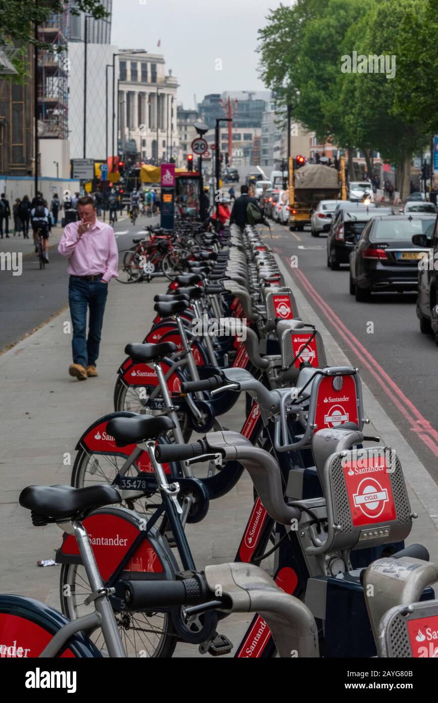 a row of Boris bikes operated by transport for London for commuters to ...