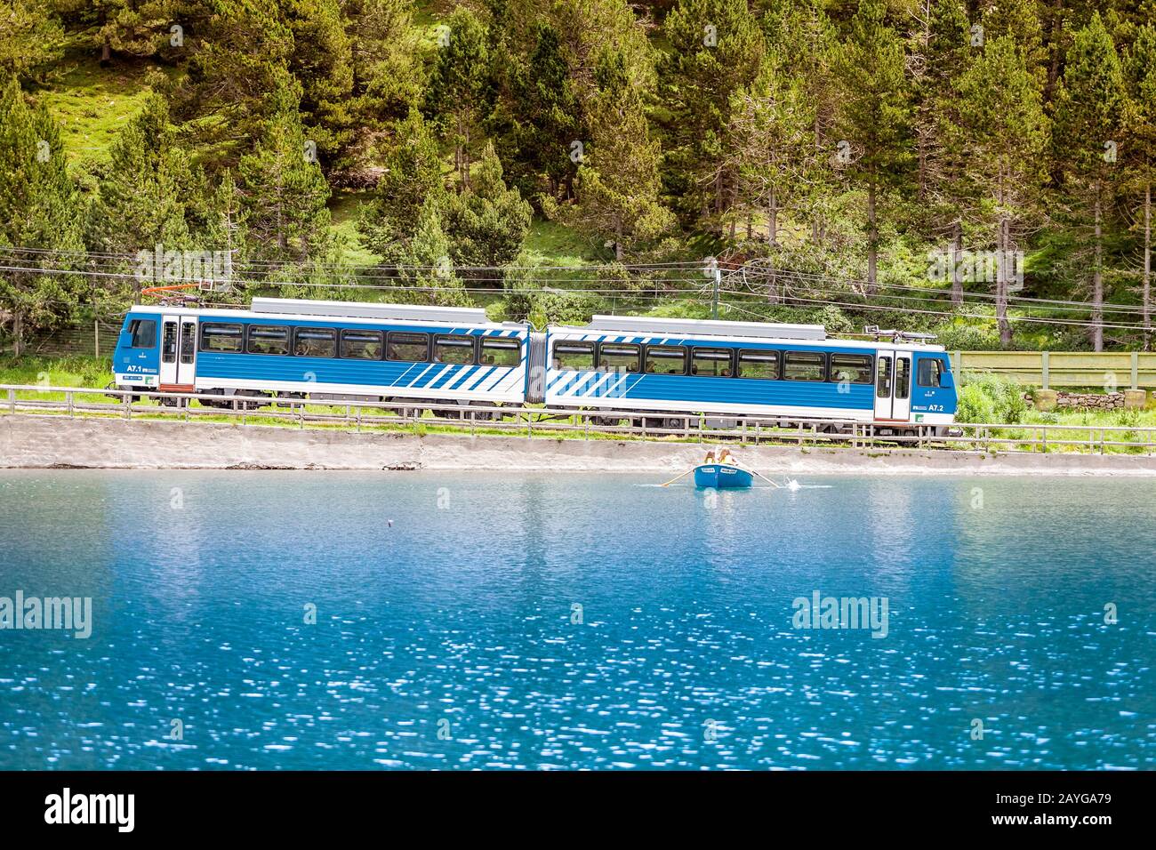 25 JULY 2018, NURIA, SPAIN: Train passing through Nuria valley against ...