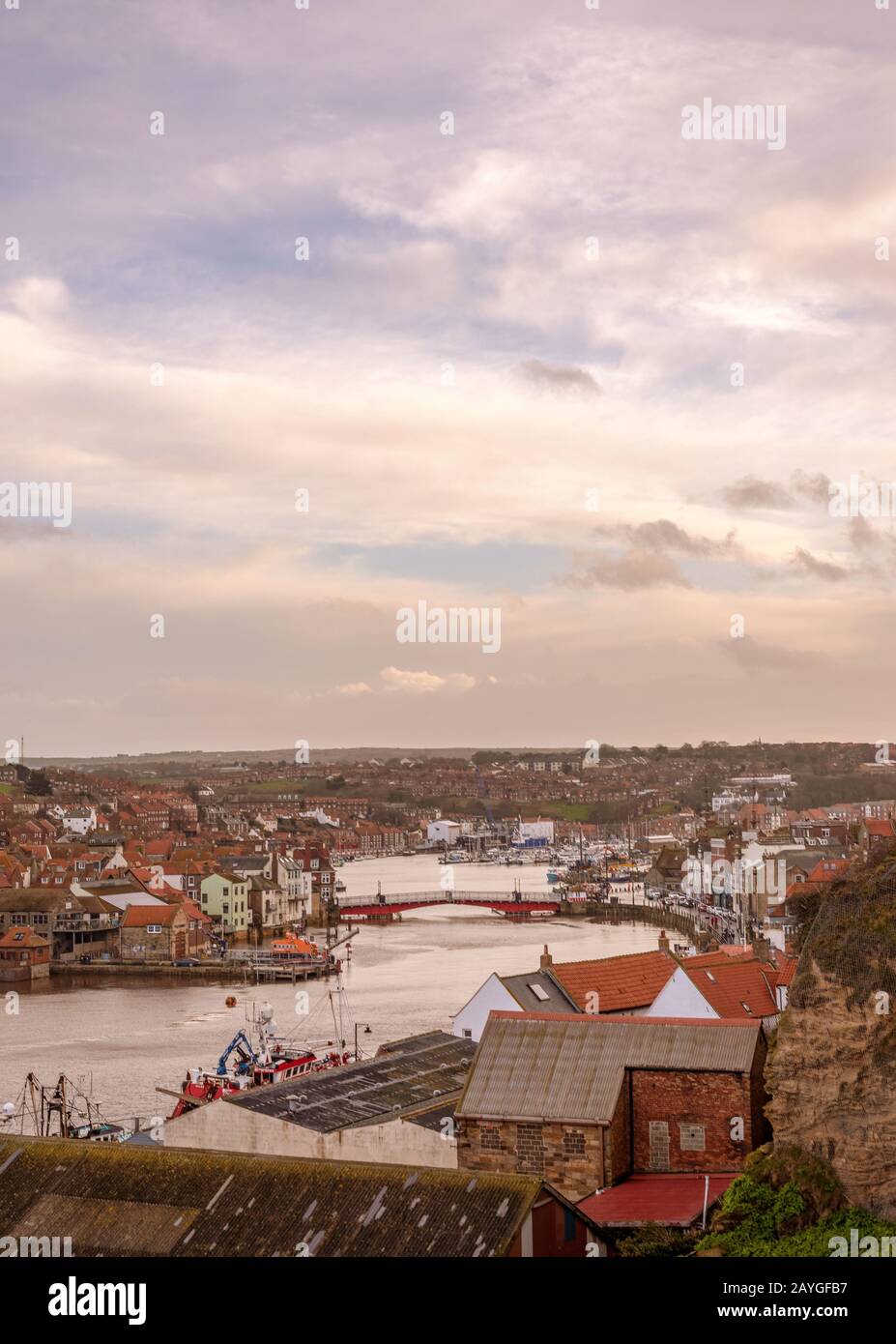 Whitby harbour and town looking inwards. The town’s buildings cluster ...