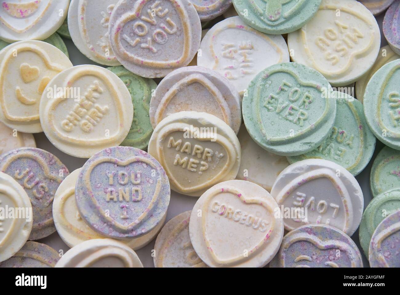 Sugar hard candy sweets which have love messages on them Stock Photo ...