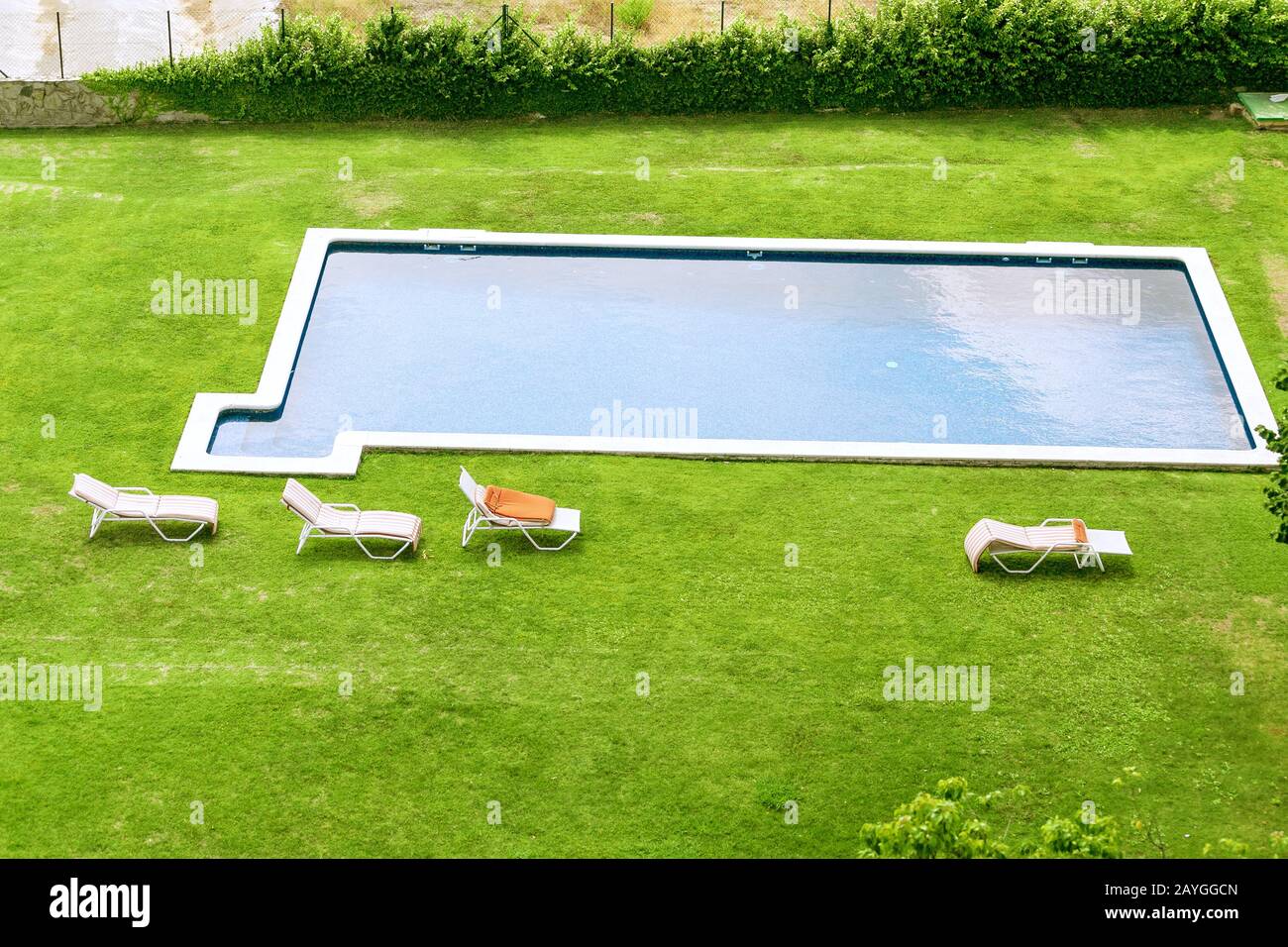 Swimming pool and grass aerial view Stock Photo - Alamy