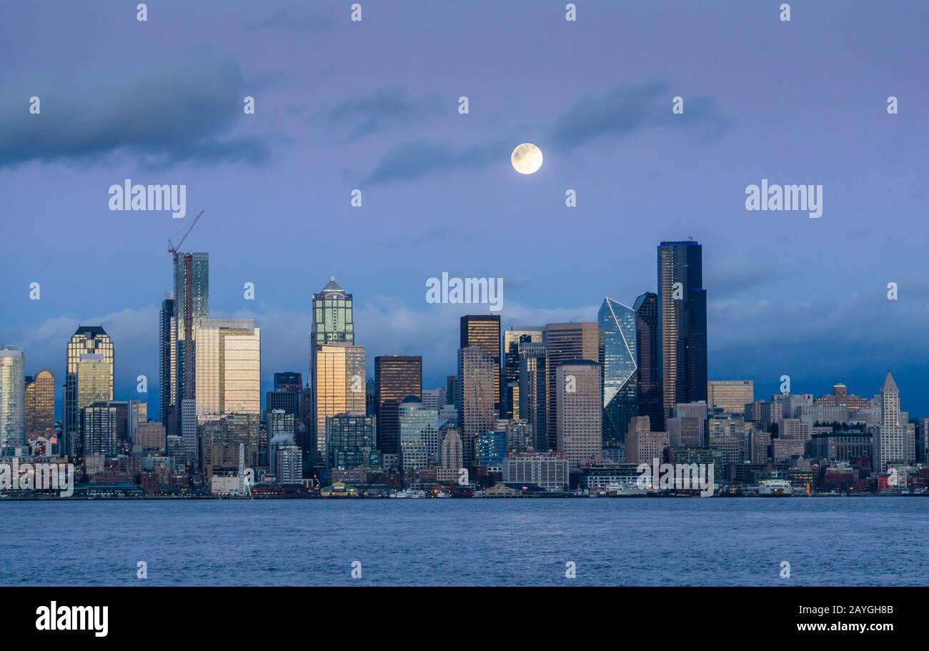 A bright full moon shines over the Seattle skyline Stock Photo - Alamy
