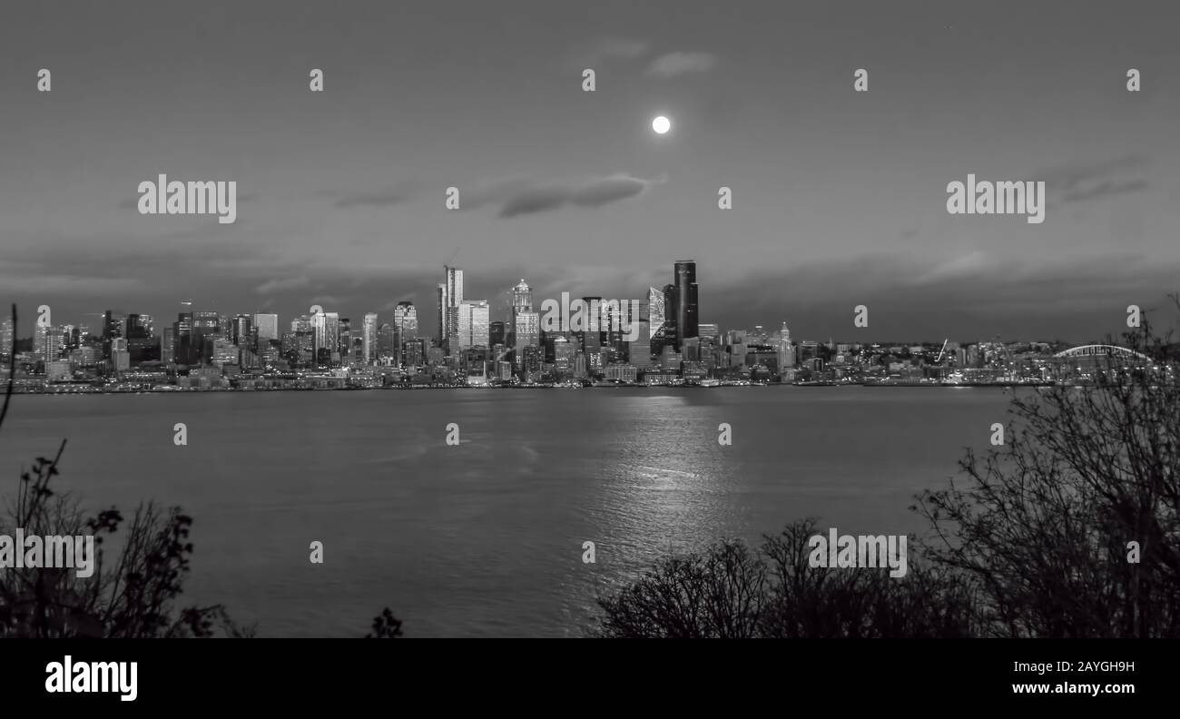 A bright full moon shines over the Seattle skyline Stock Photo - Alamy