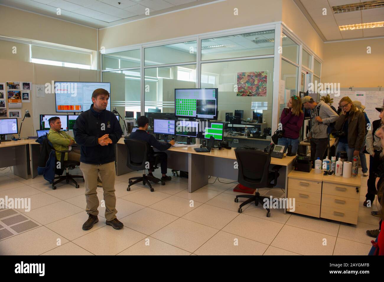 Scientist working in a control room at ALMA (Atacama Large Millimeter ...