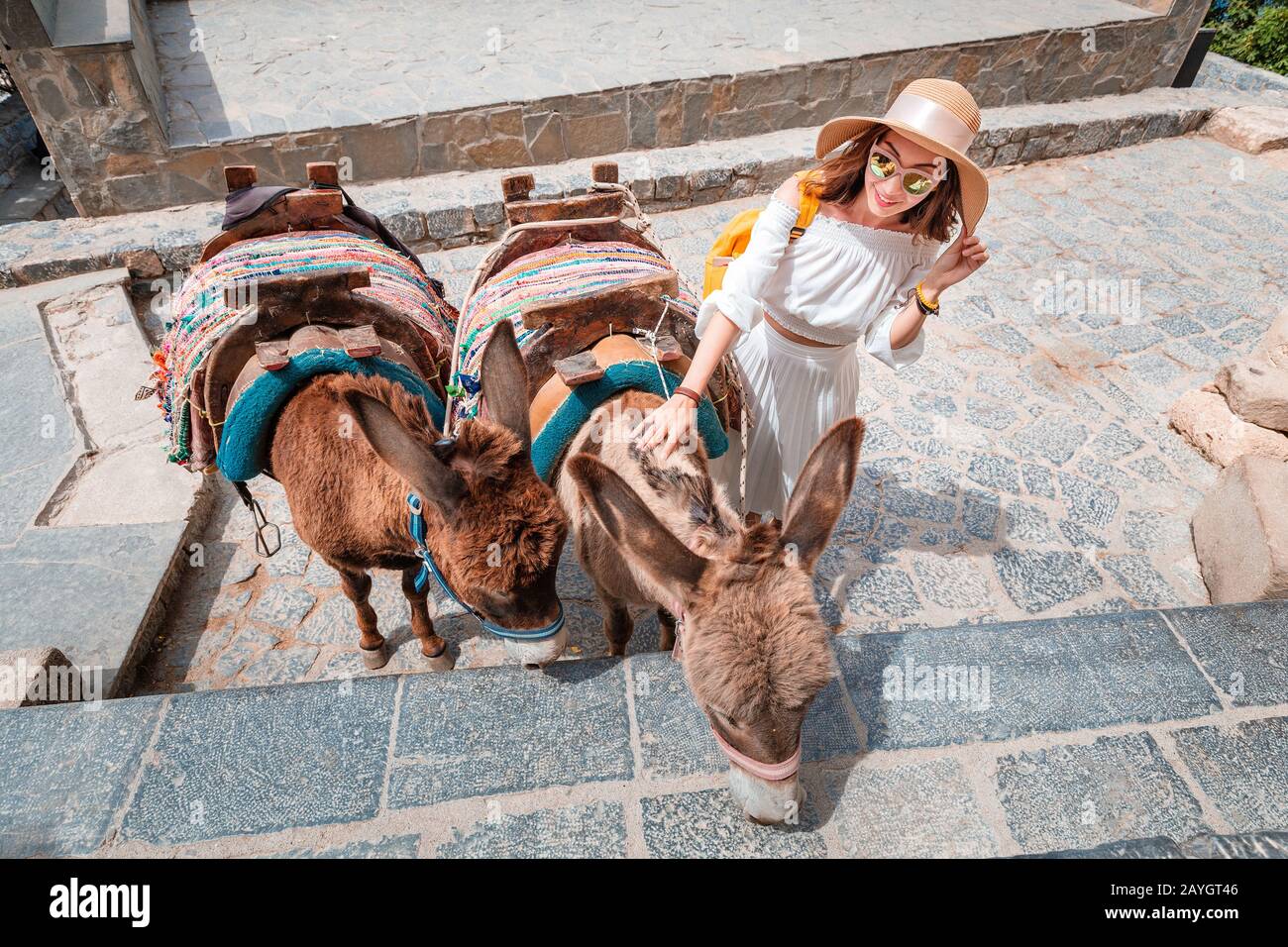 Woman Riding Donkey High Resolution Stock Photography and Images - Alamy