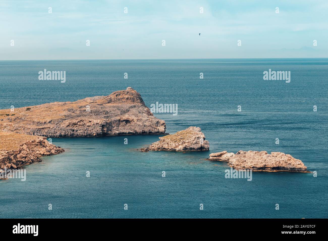 aerial view of a rocky islands in endless sea Stock Photo - Alamy