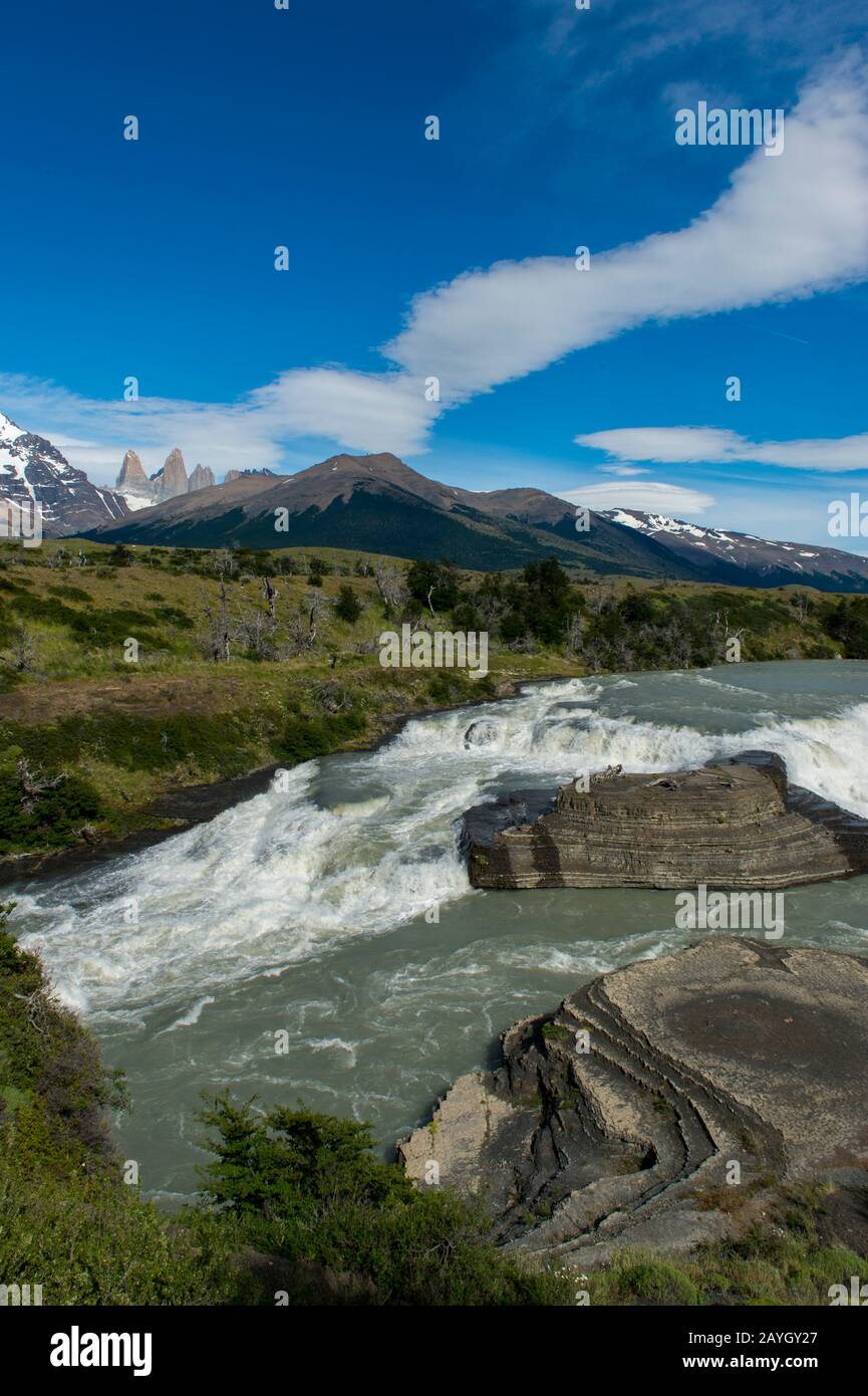 View of the Paine River waterfall with Admiral Nieto Mountain (left ...