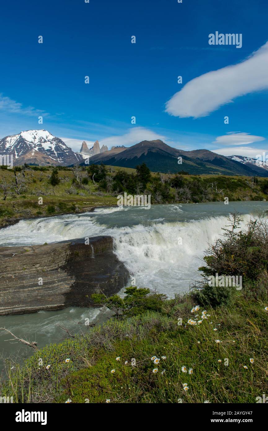 View of the Paine River waterfall with Admiral Nieto Mountain (left ...